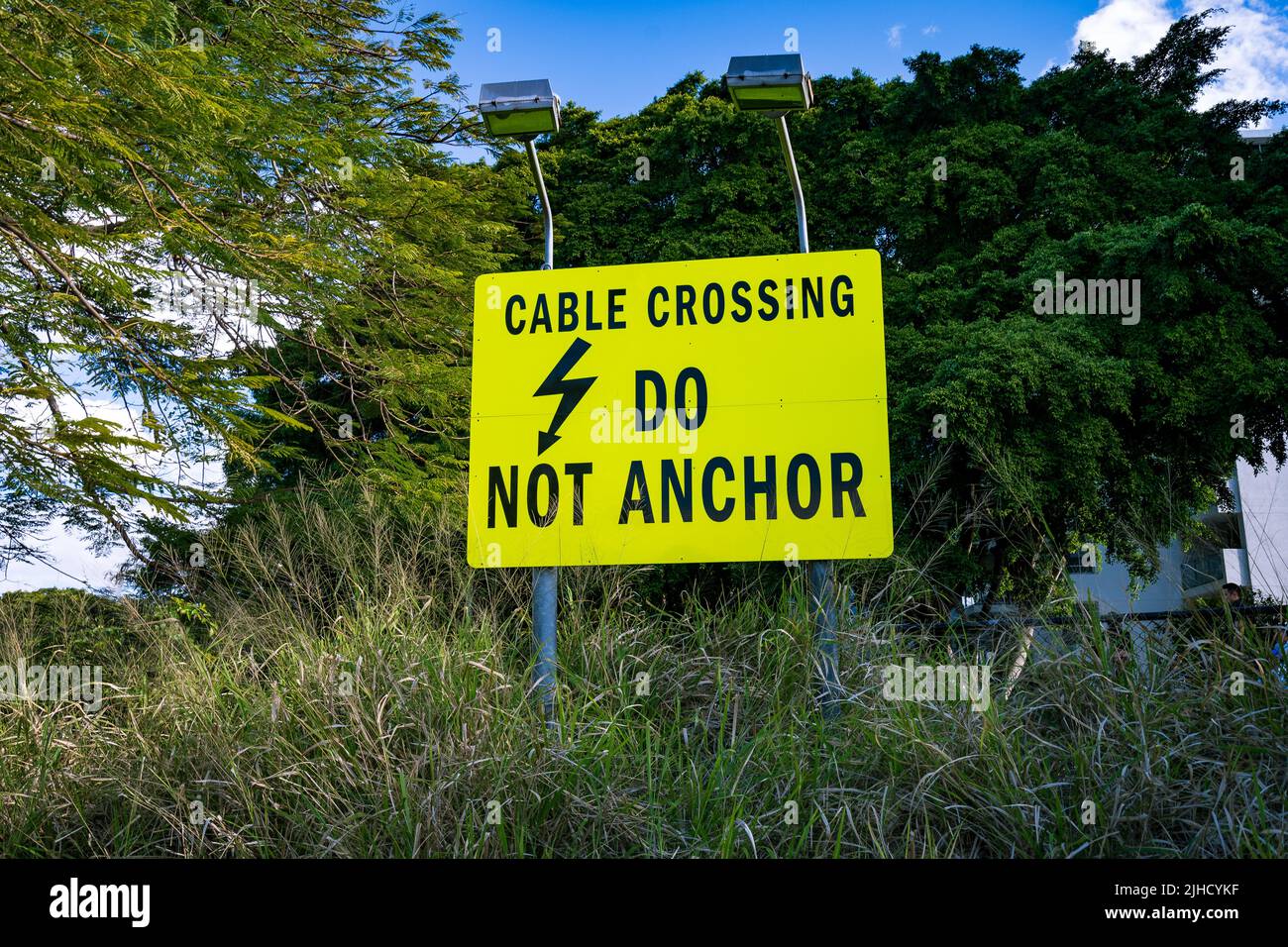 Cable crossing, do not anchor sign Stock Photo - Alamy