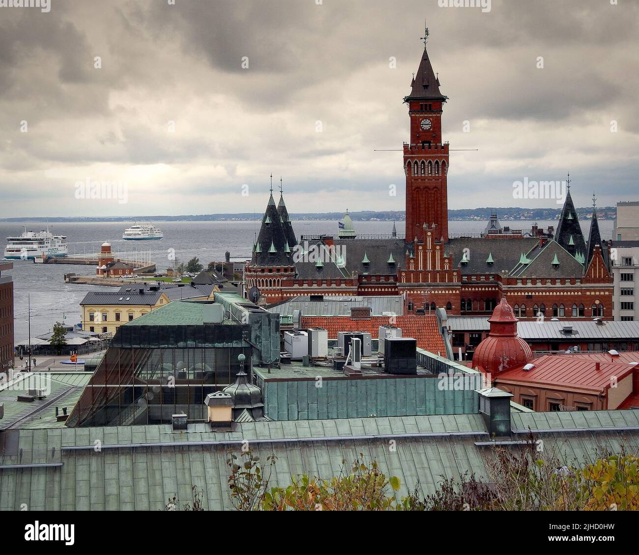 An elevated view of old rooftops and the Ferry traffic in Helsingborg ...