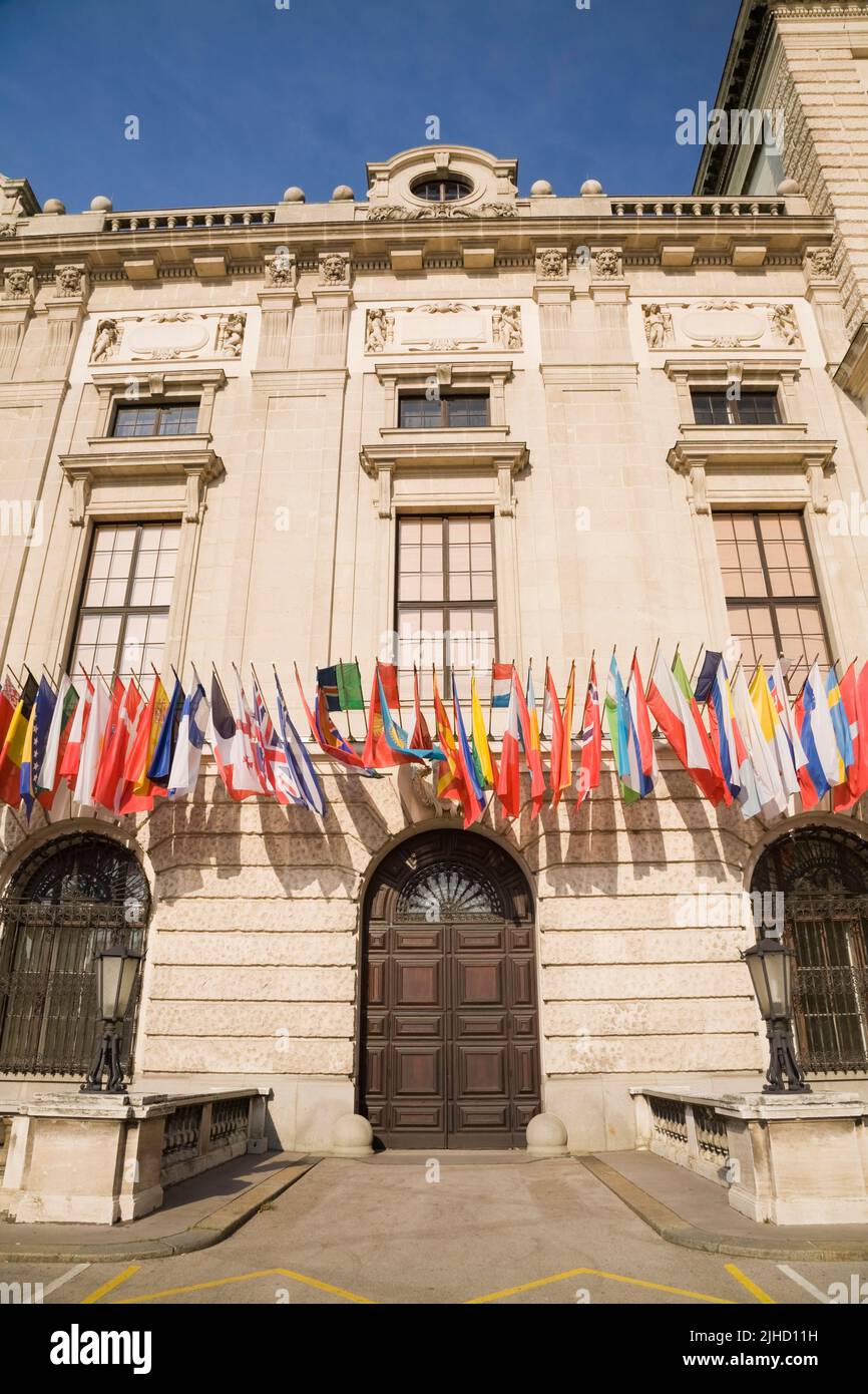 Old architectural style building with flags at the Hofburg Palace ...