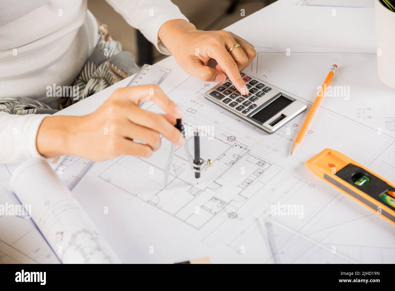 Architectural project workplace. Engineer sketching construction ...