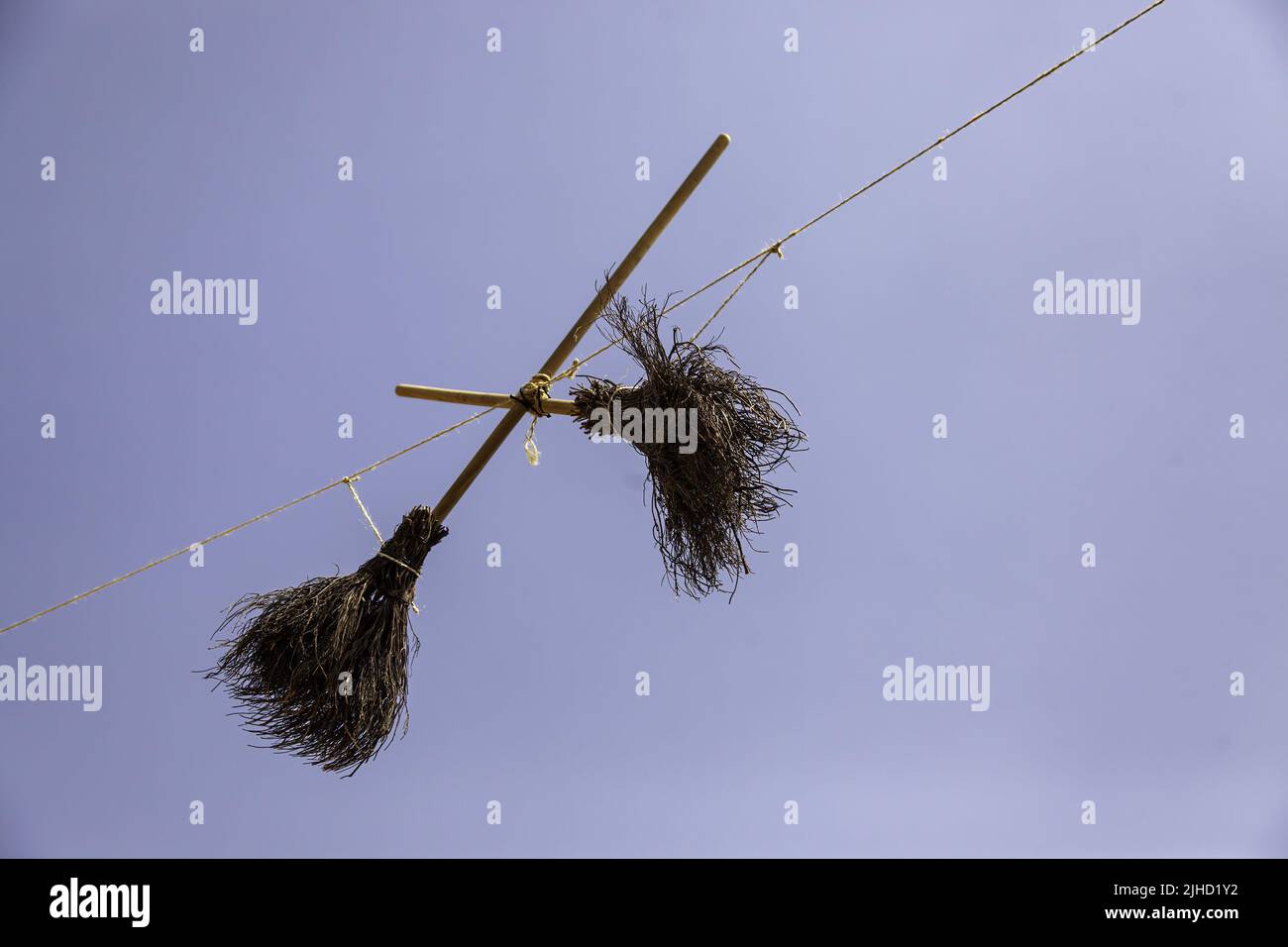 Detail of halloween decoration with witches brooms Stock Photo - Alamy