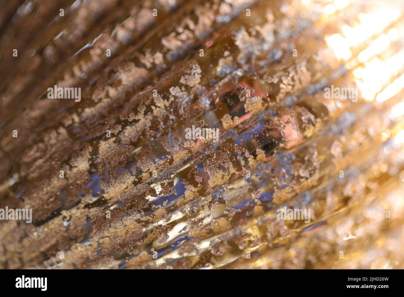 Ribbed shiny surface.Shabby metal background with traces of rust ...