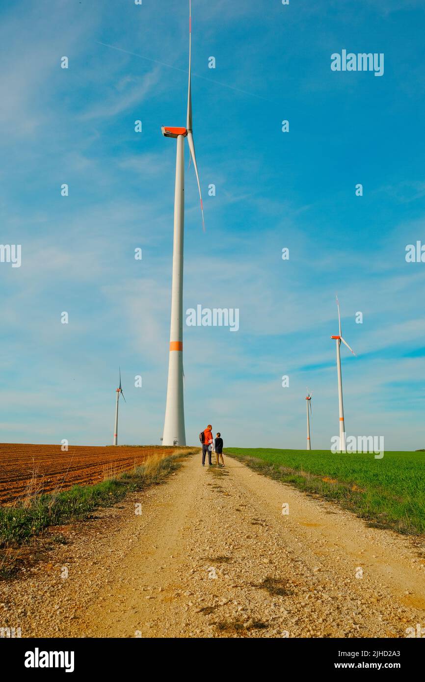 Wind energy.Inspection of wind turbines.Windmillsand People near on the ...