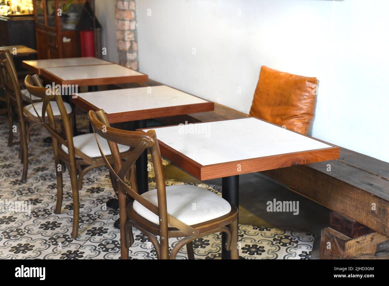 Wooden tables and chairs in a coffee shop Stock Photo - Alamy