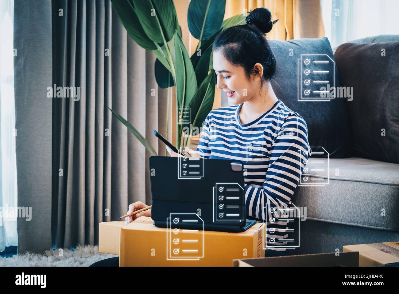 Online merchandising business idea, beautiful girl using mobile phone ...