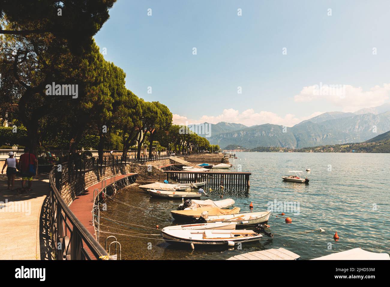 Boats docked in Lake Como Stock Photo - Alamy