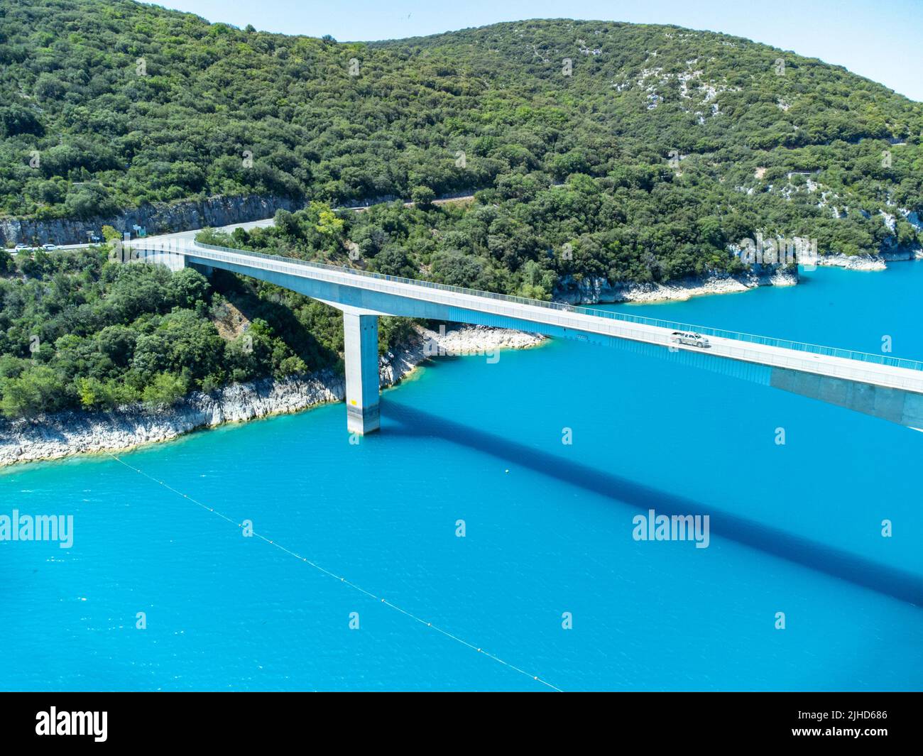 Aerial view on blue lake Sainte-Croix-du-Verdon, bridge, forest, cliffs ...