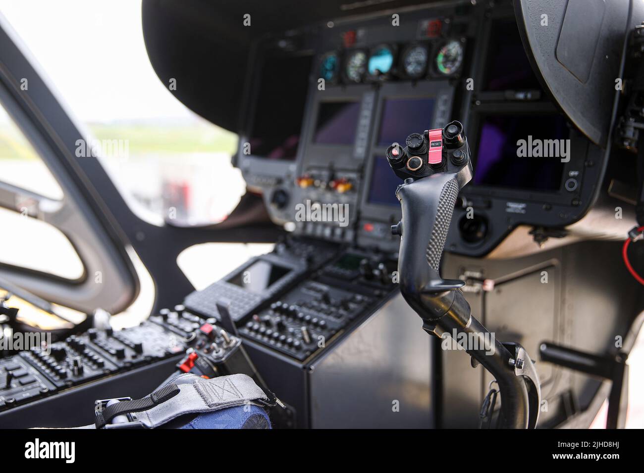 A cockpit and cyclic stick of an emergency medical helicopter. (Photo ...