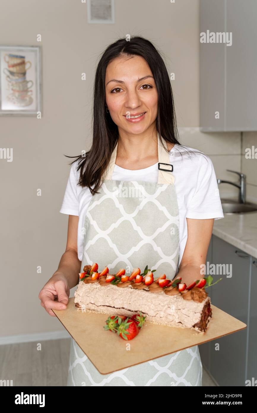 Woman cakes on a tray hi-res stock photography and images - Alamy