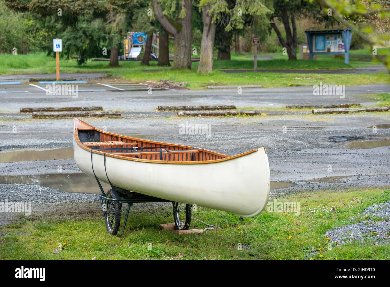 Issaquah, Washington, USA. Canoe strapped to a cart / dolley ready to ...