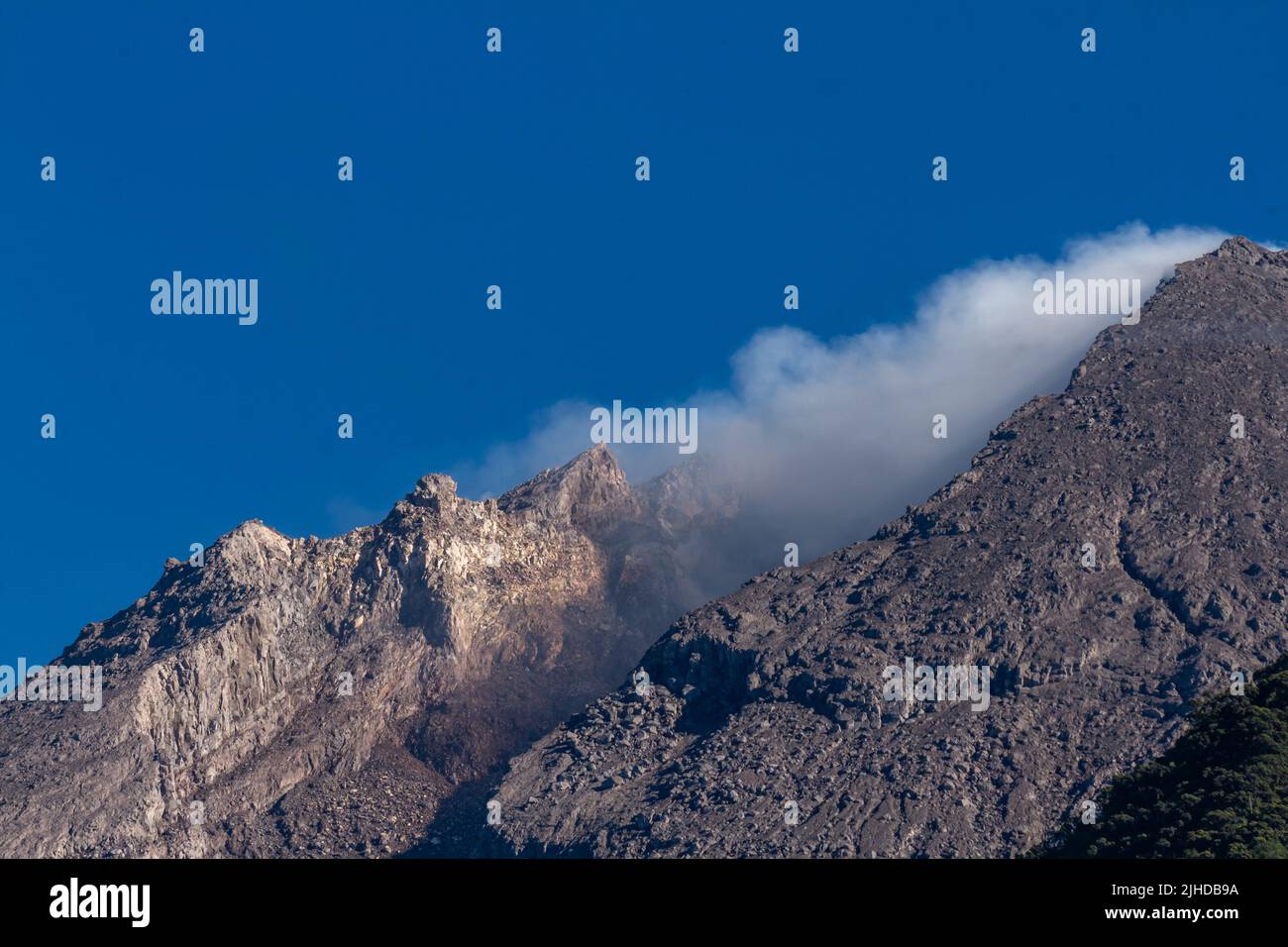 Close up of the crater of Mount Merapi, which is slightly covered in ...