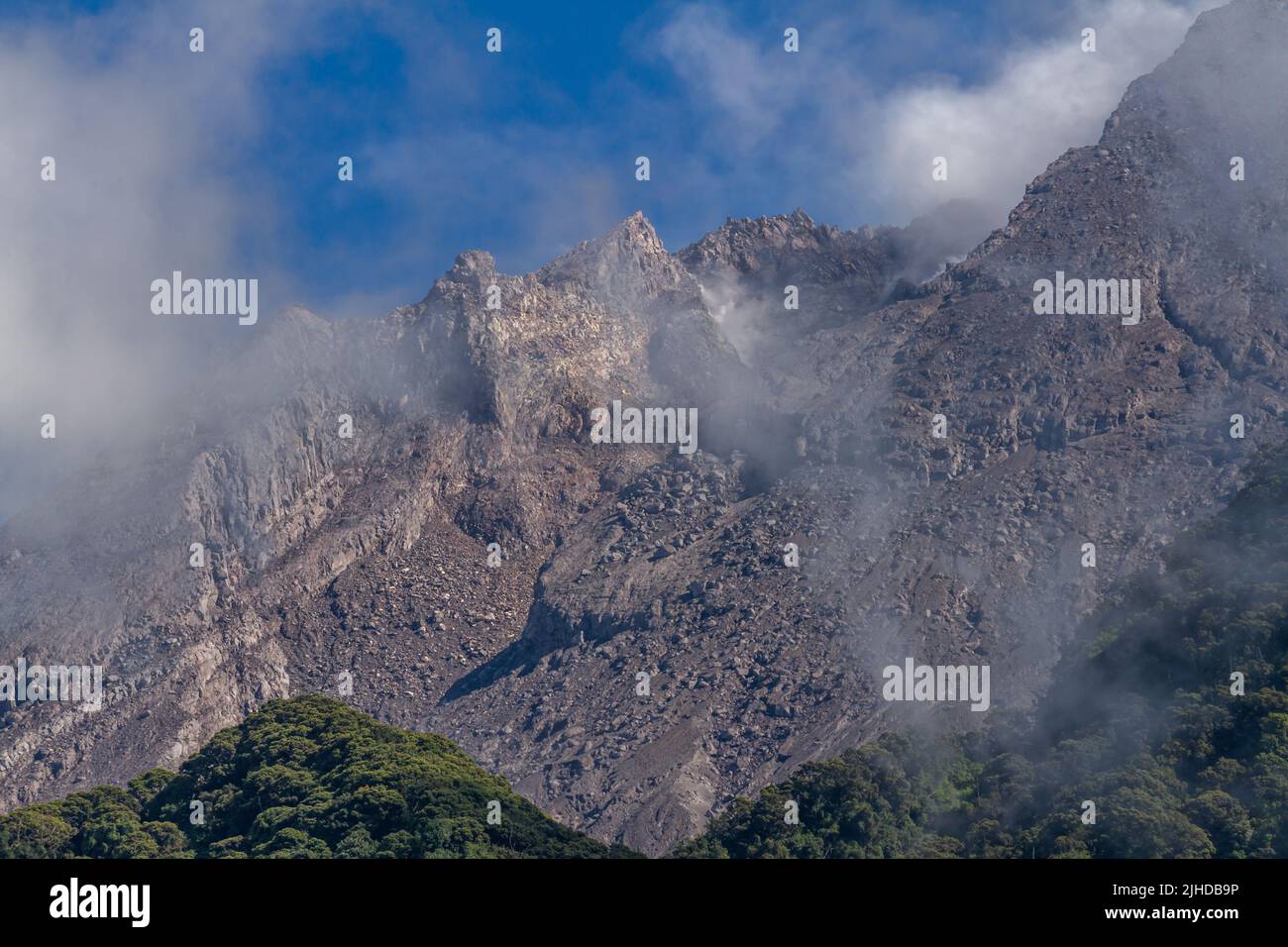 Close up of the crater of Mount Merapi, which is slightly covered in ...