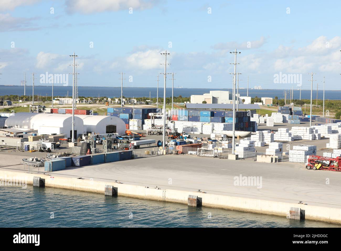 The Port of Miami with big containerships and cranes, in the back the ...