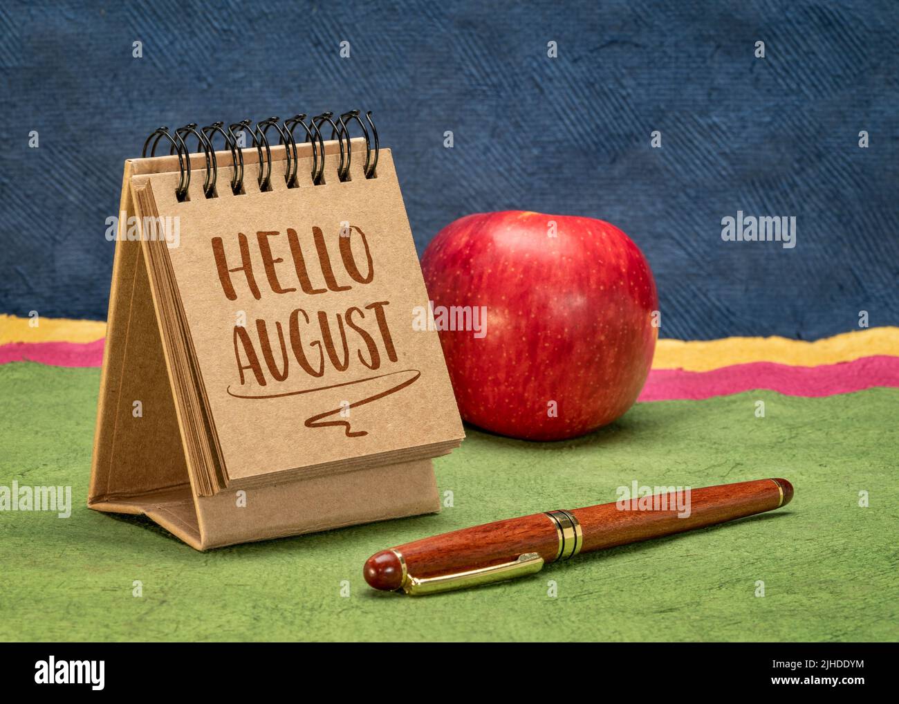 Hello August greeting note - handwriting in a small desktop calendar ...