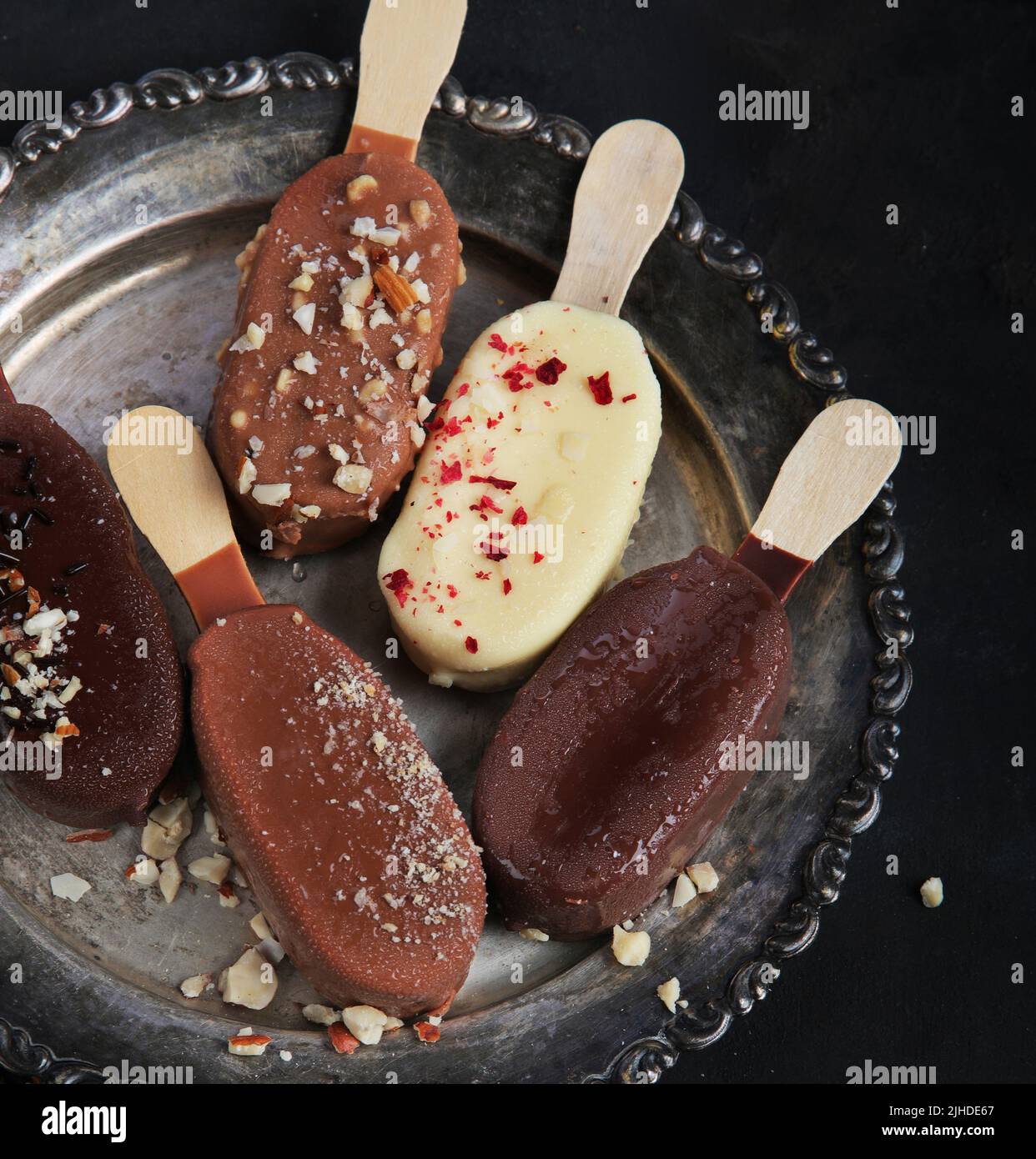 Popsicle ice-cream assortment on dark background. Spring natural ...