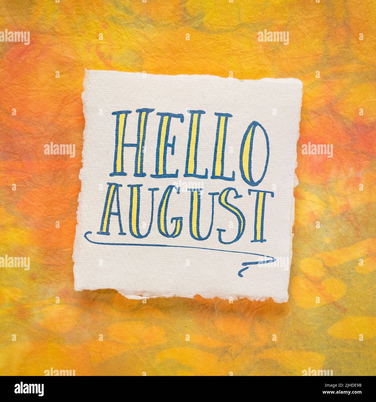 Hello August greeting note - handwriting on a white handmade paper ...
