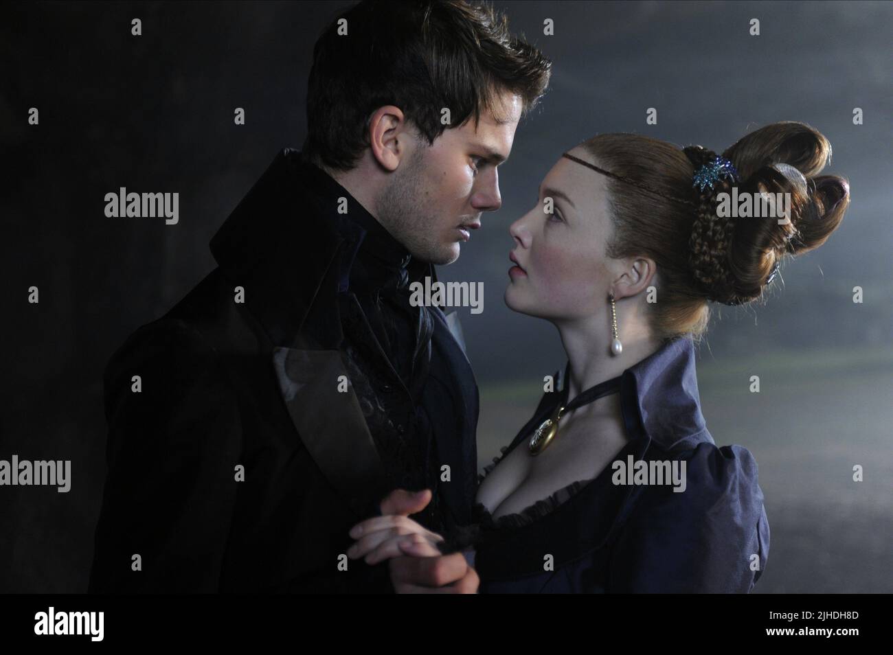 JEREMY IRVINE, HOLLIDAY GRAINGER, GREAT EXPECTATIONS, 2012 Stock Photo ...