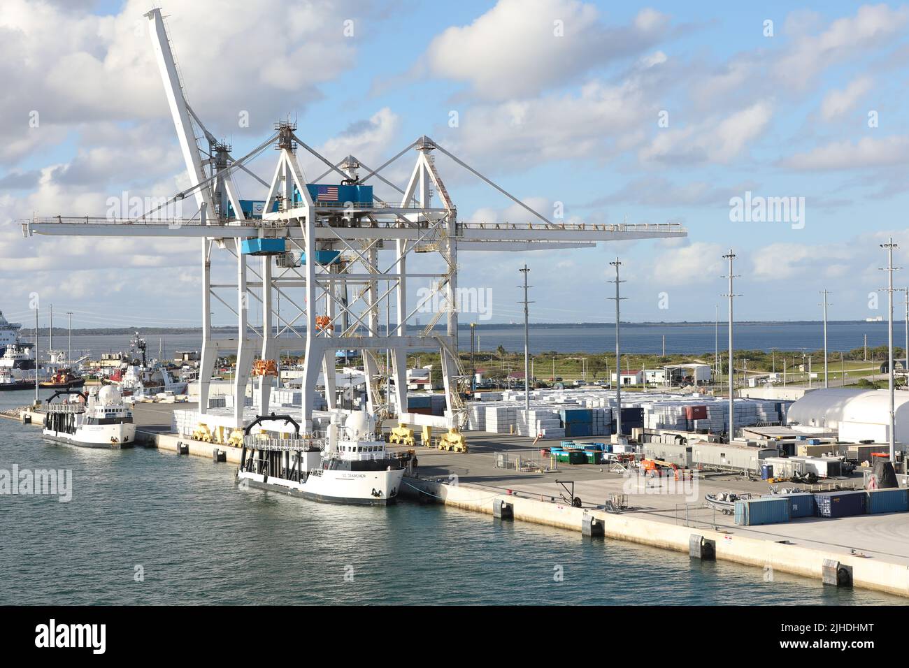 The Port of Miami with big containerships and cranes, in the back the ...