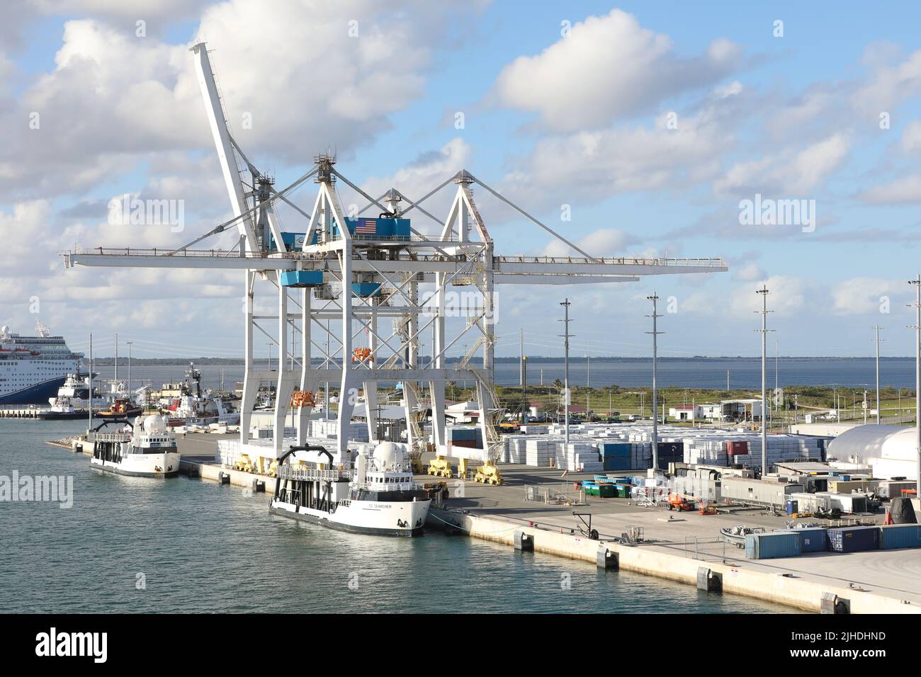 The Port of Miami with big containerships and cranes, in the back the ...