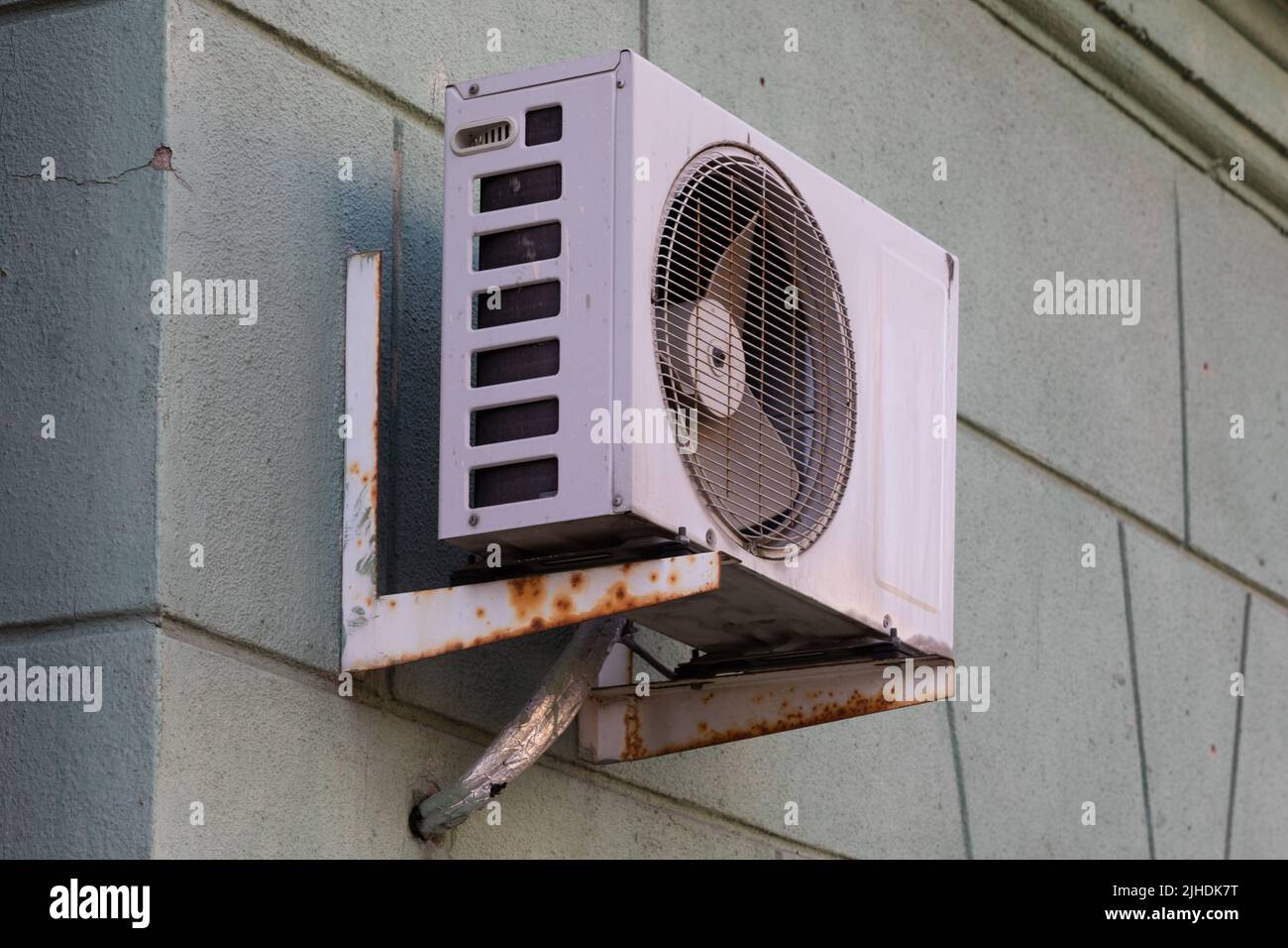 old air conditioning refrigeration unit outside the building Stock ...