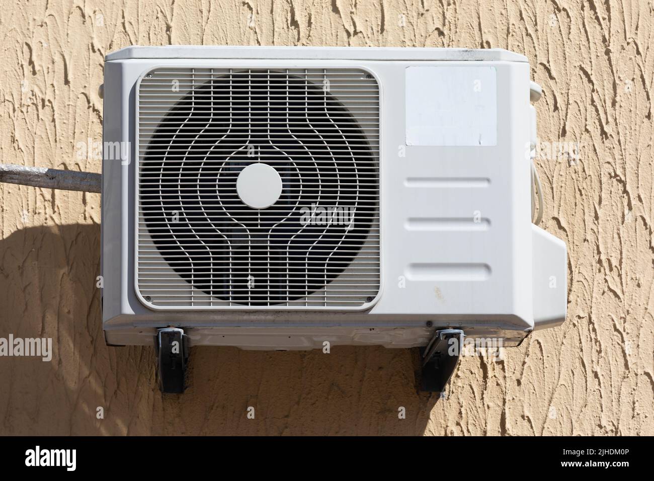 old outdoor air conditioner unit hanging outside the building Stock ...