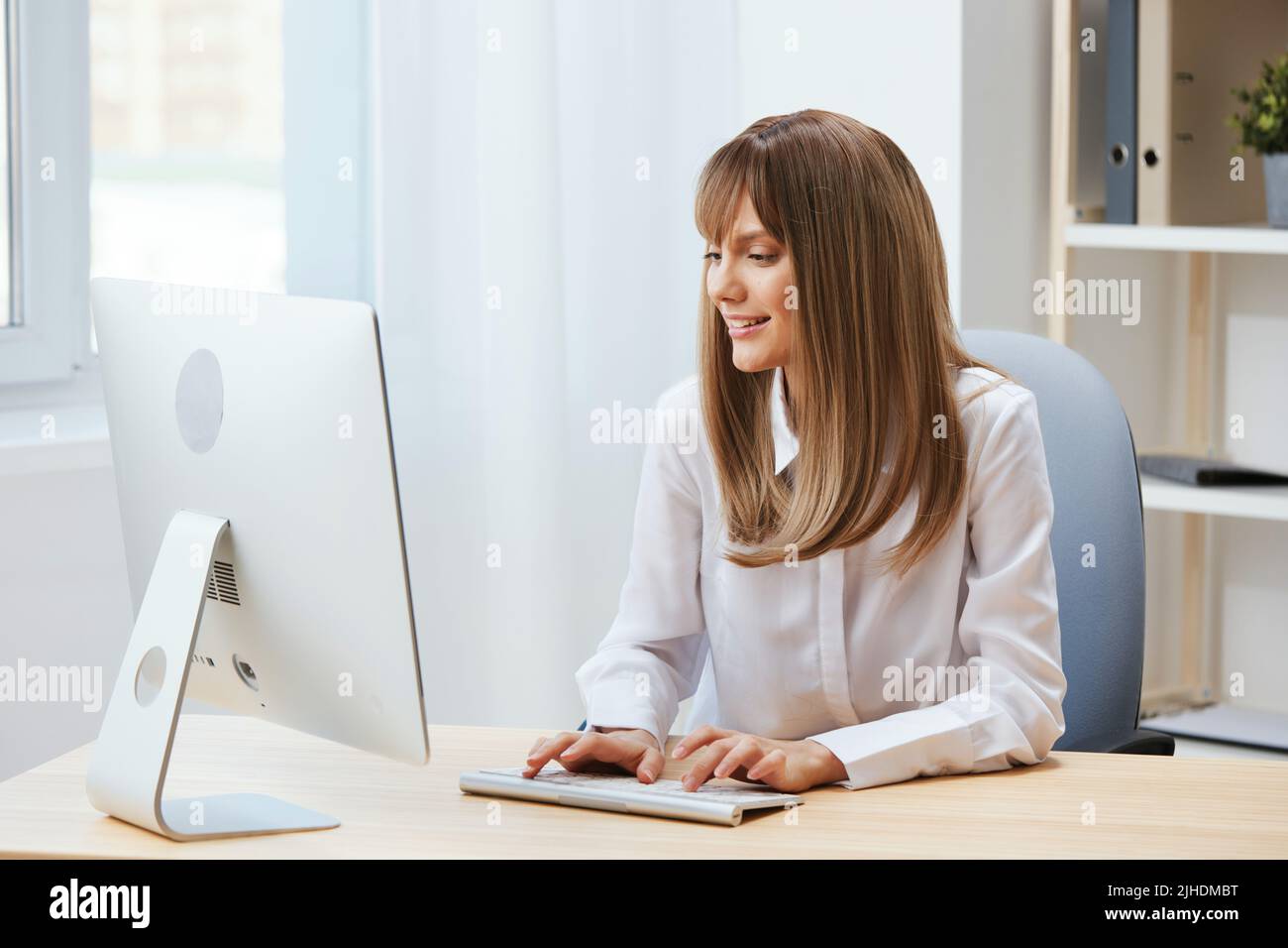 Cheerful happy adorable blonde businesswoman worker freelancer look at ...