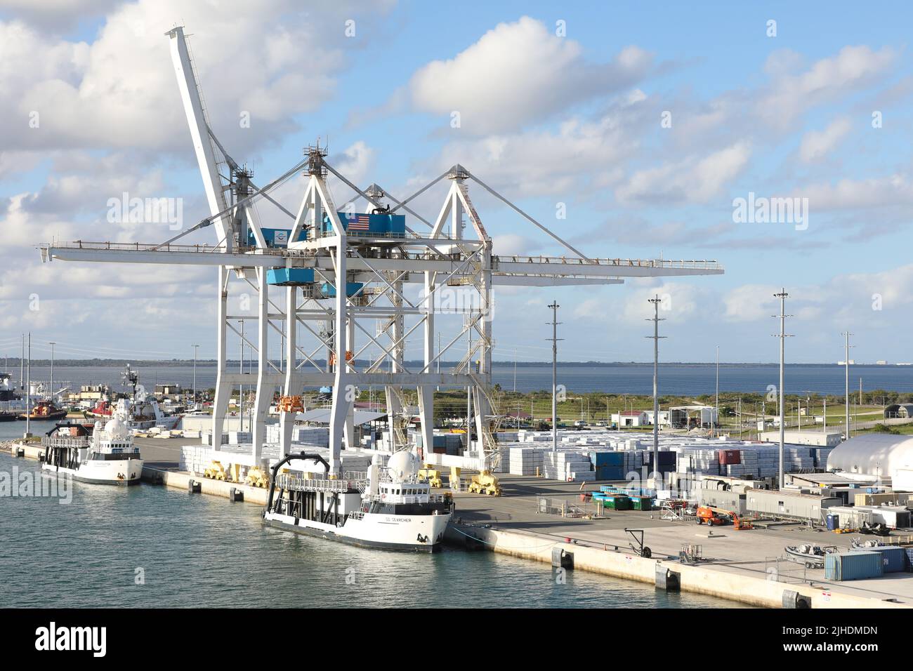 The Port of Miami with big containerships and cranes, in the back the ...