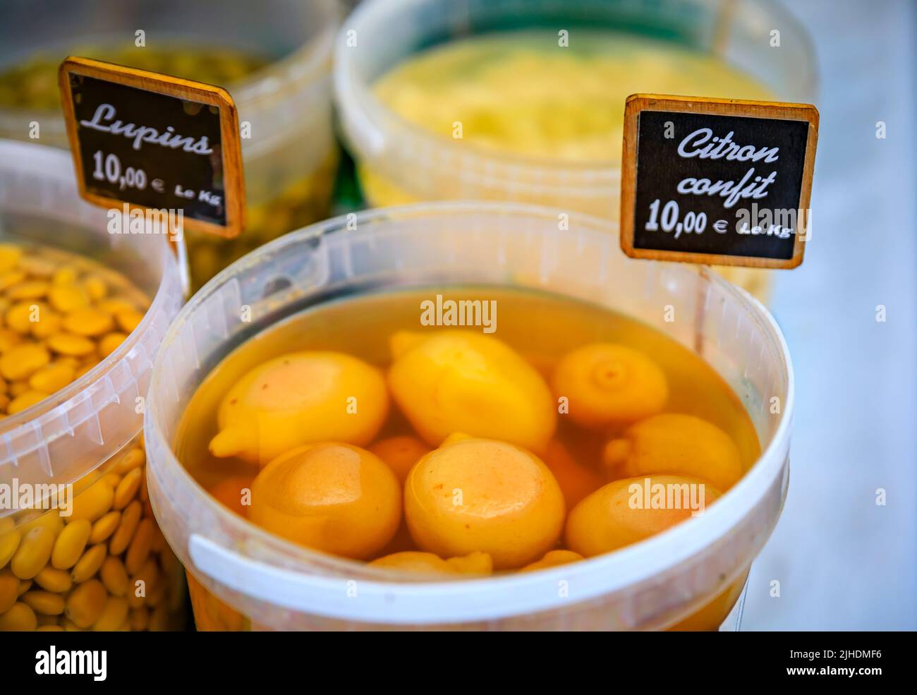 Lemon confit, traditional preserve for sale at a local farmers market ...