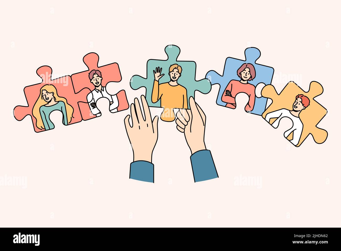 Hands joining jigsaw puzzles with employees engaged in employment and ...