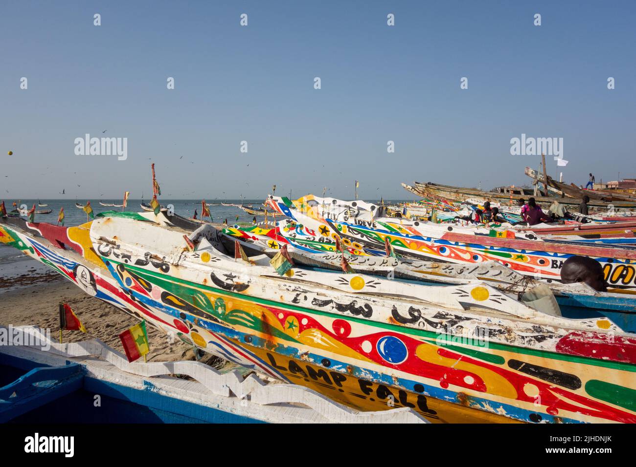 TANJI, THE GAMBIA - FEBRUARY 6, 2022 the colourful fishing boats of the ...