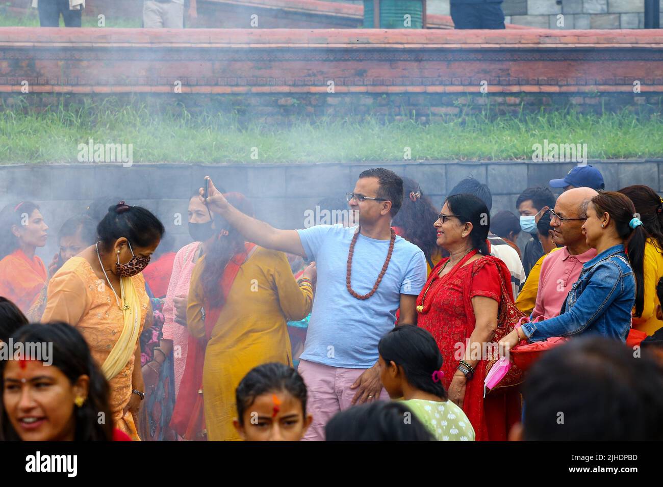 On July18,2022 in Kathmandu, Nepal. Family members take selife outside ...