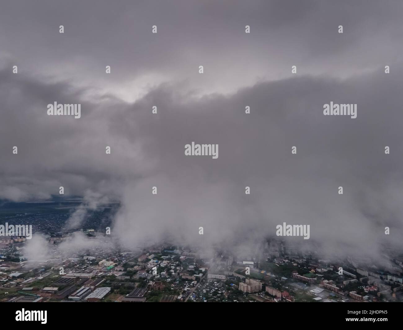 Flying through thick clouds. Rain clouds in the sky. Cumulus clouds, meteorology and climate ...