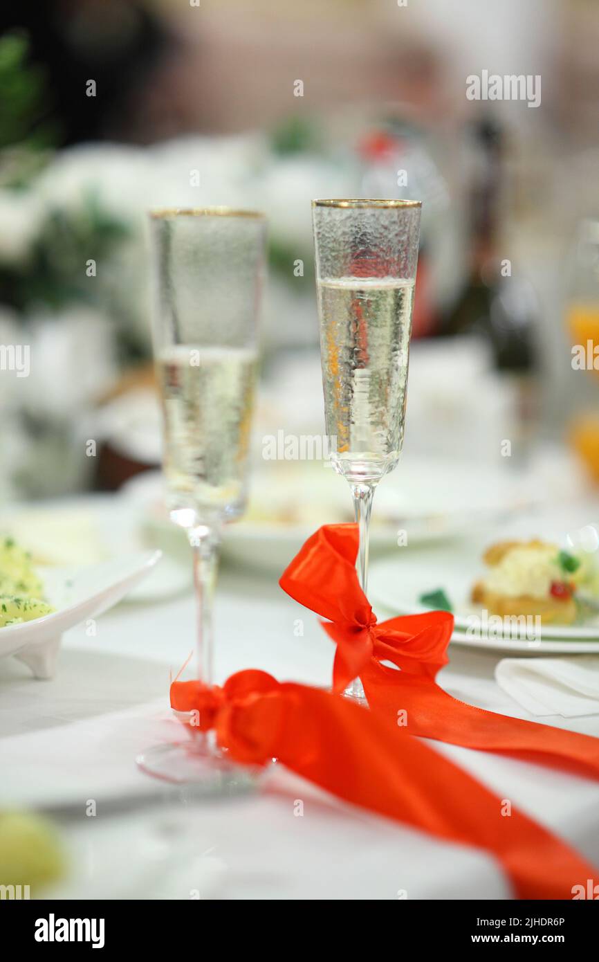 Table setting in a restaurant. Table setting with glasses, cutlery and ...