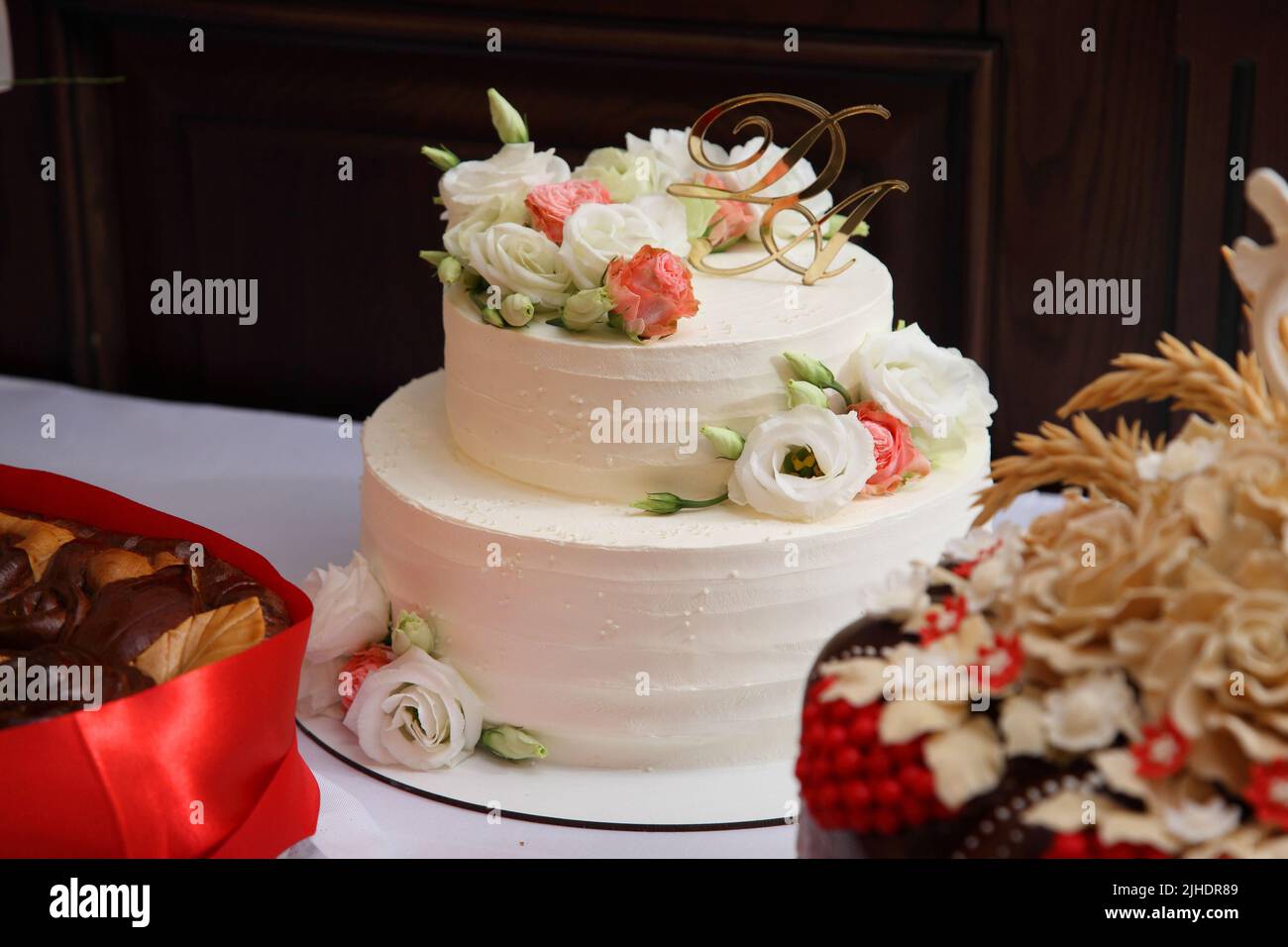 Wedding cake. Birthday cake with decorations. Culinary arts desserts ...