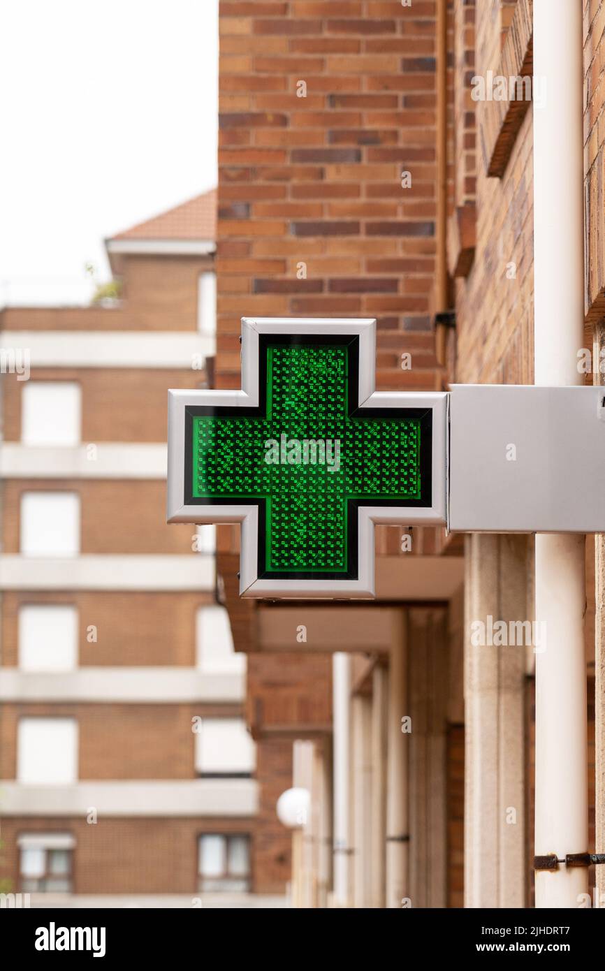 Hospital sign. Emergency help symbol. Illuminated signboard. Urban ...