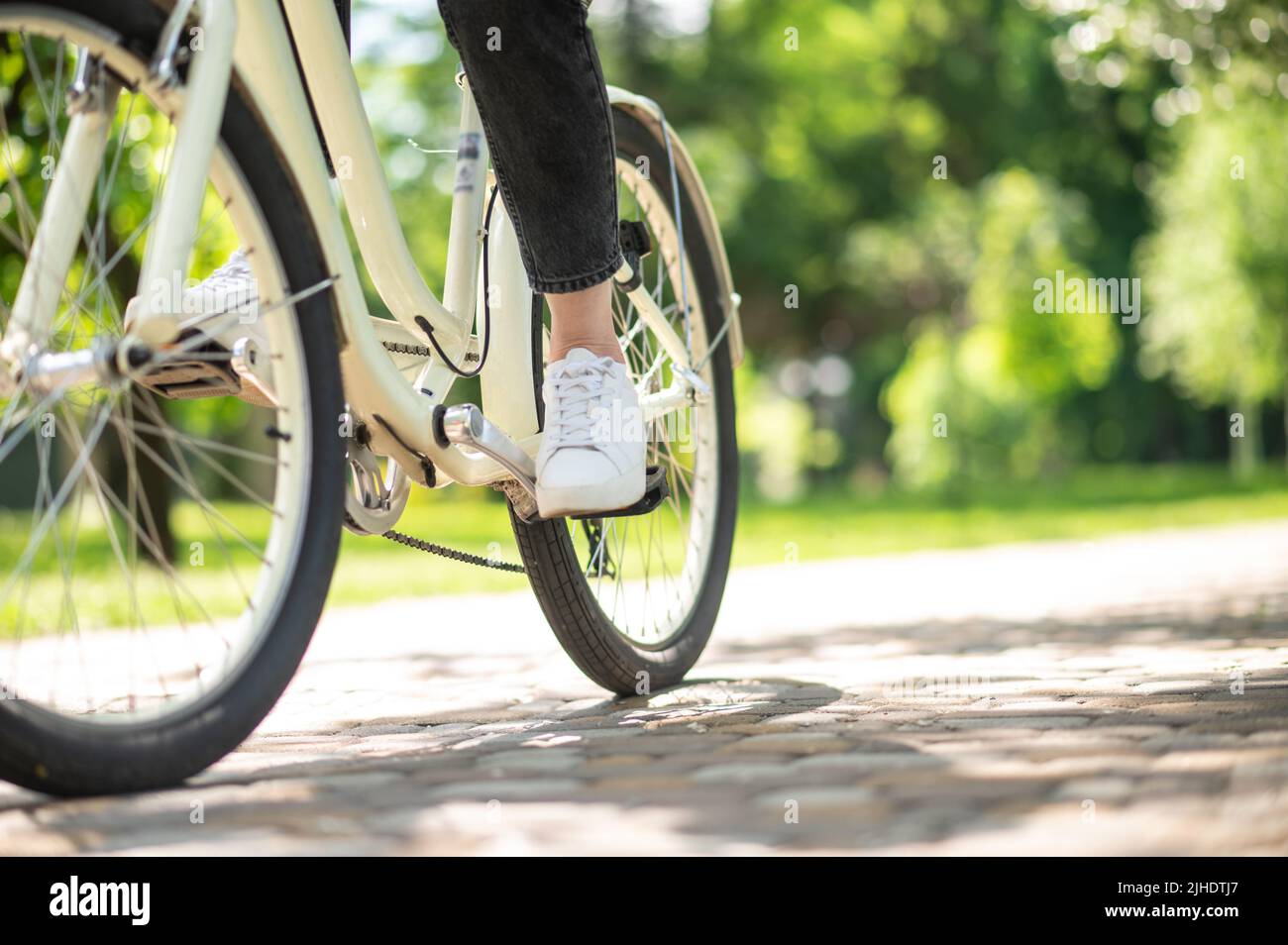 Person on bike hi-res stock photography and images - Alamy