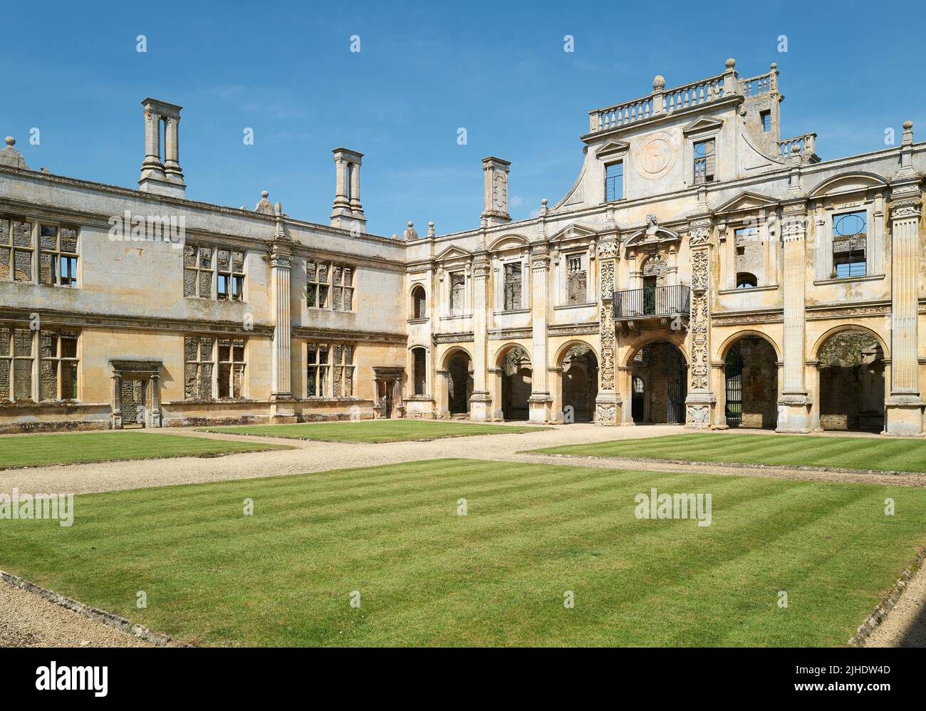 Well kept garden in the inner court of a dilapidated and ruined english ...
