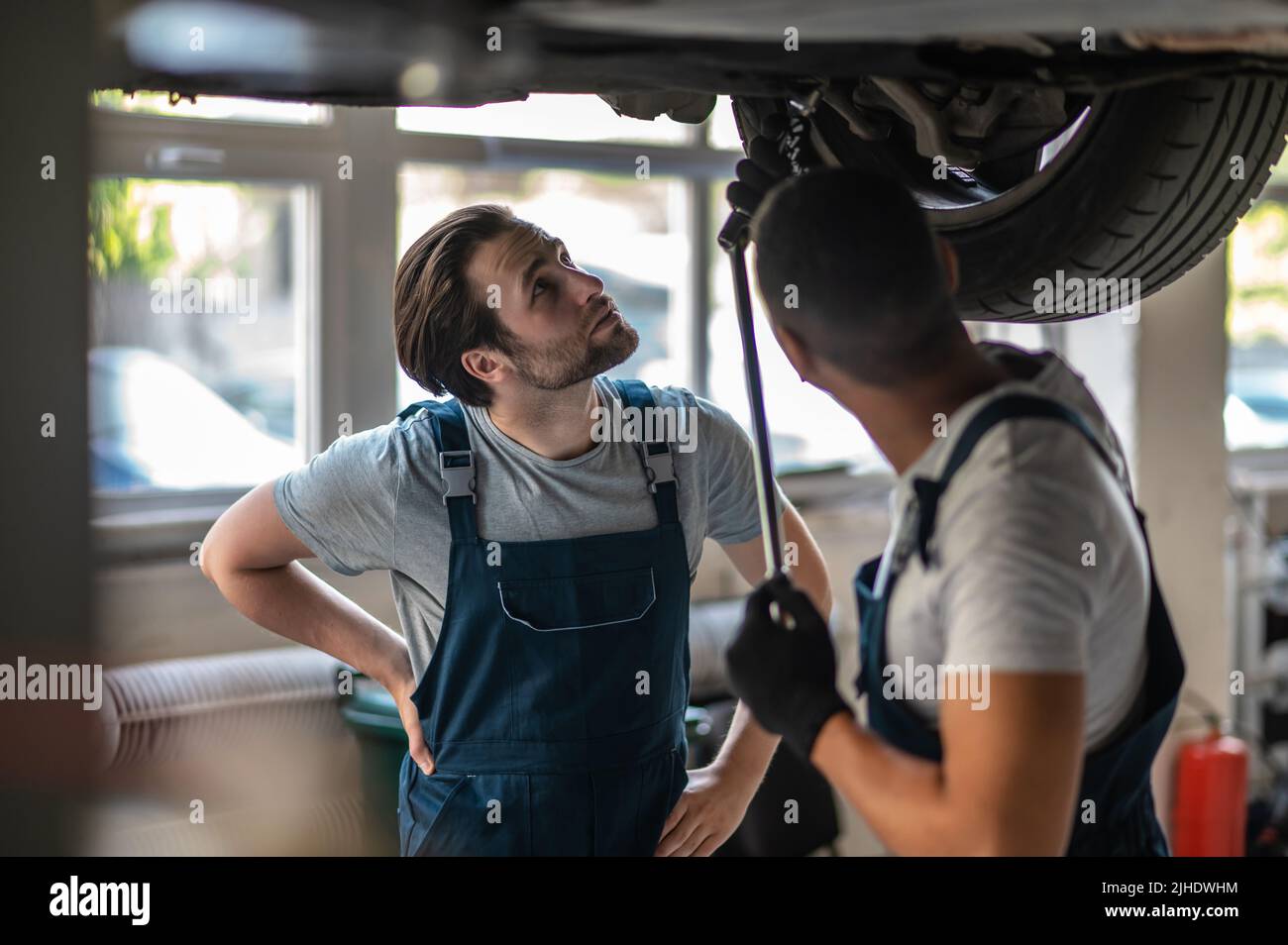Car repair workers work hi-res stock photography and images - Alamy