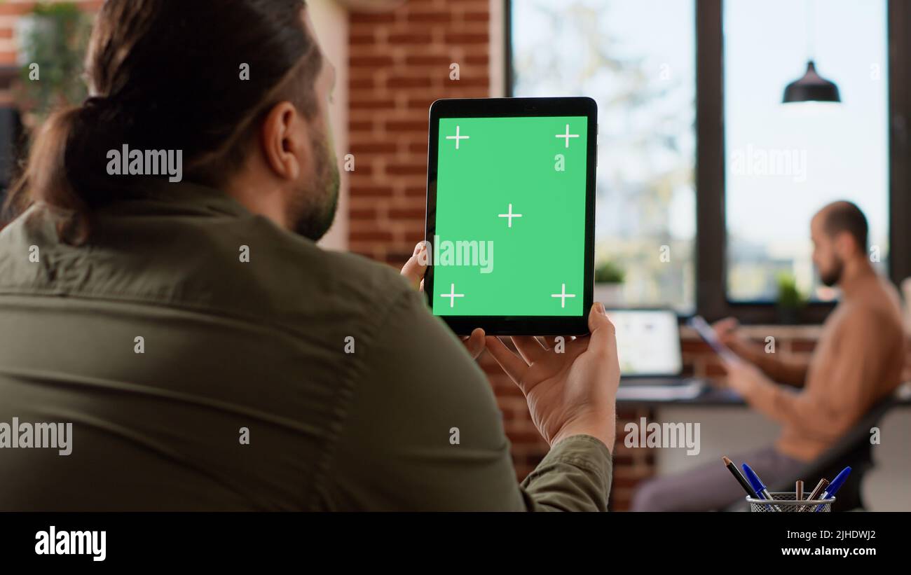 Office worker analyzing greenscreen template hi-res stock photography ...