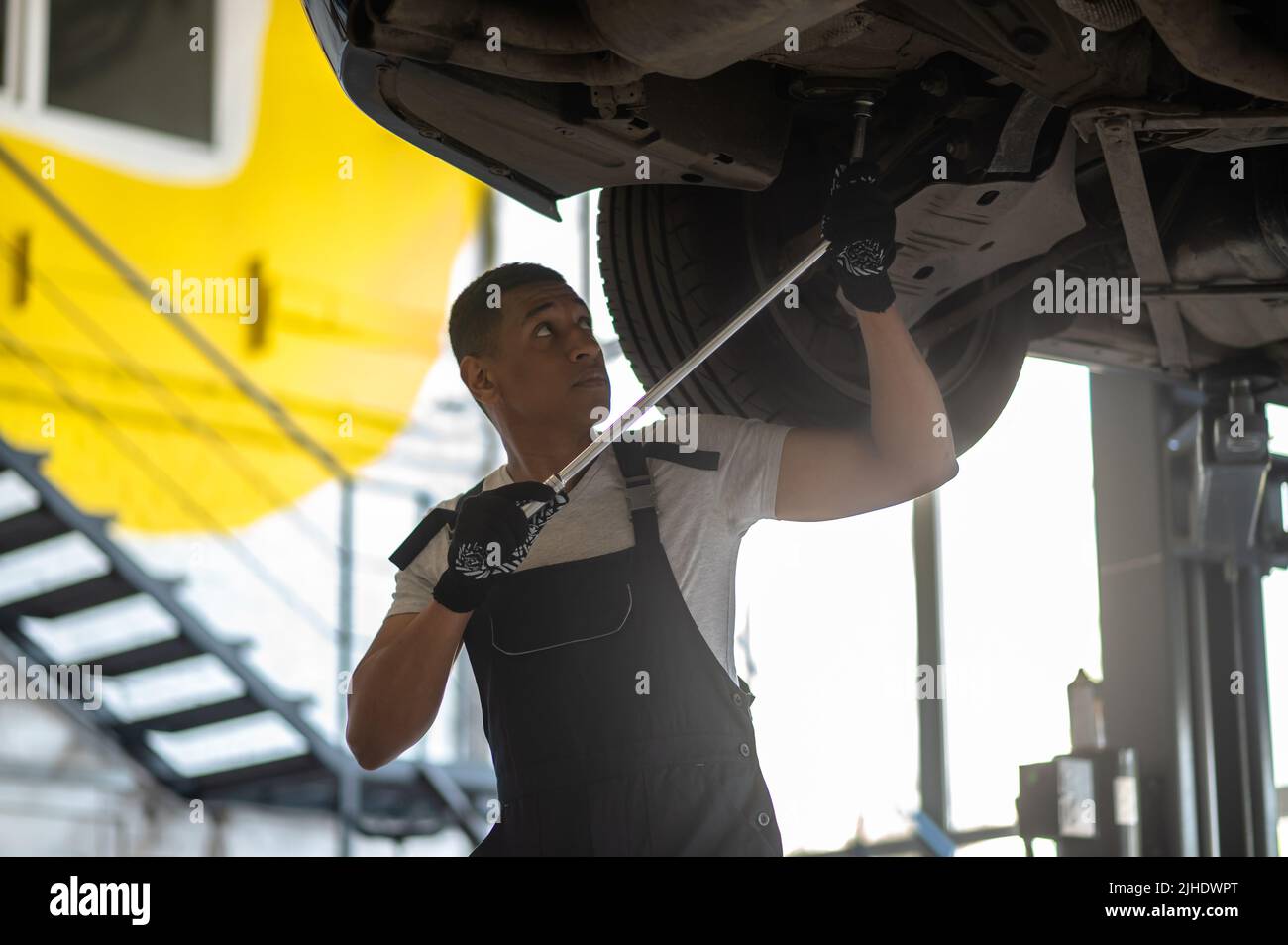 Fixing an automobile hi-res stock photography and images - Alamy