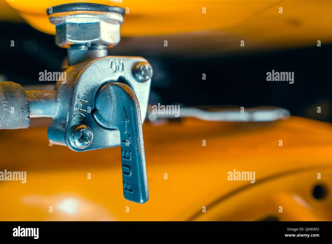 Close-up open fuel tank tap. Fuel supply open Stock Photo - Alamy