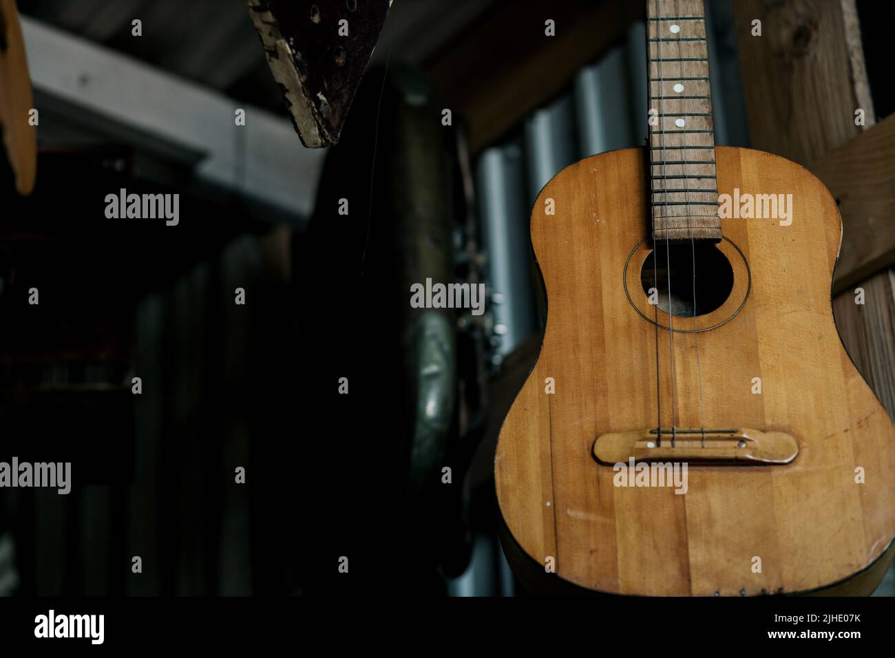 old-fashioned acoustic guitar. vintage musical instrument Stock Photo ...