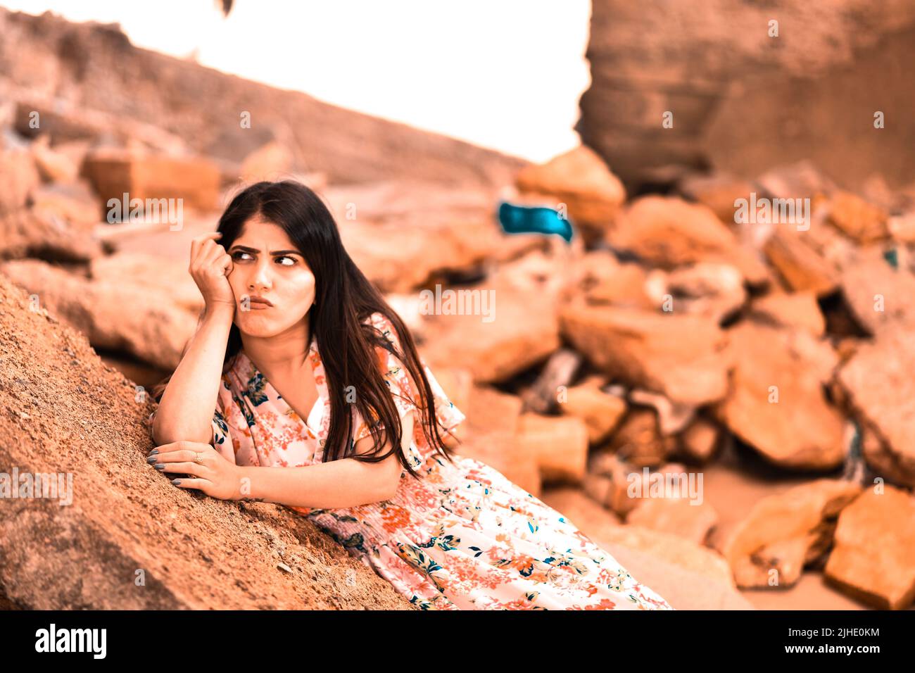 Laying on rock hi-res stock photography and images - Alamy