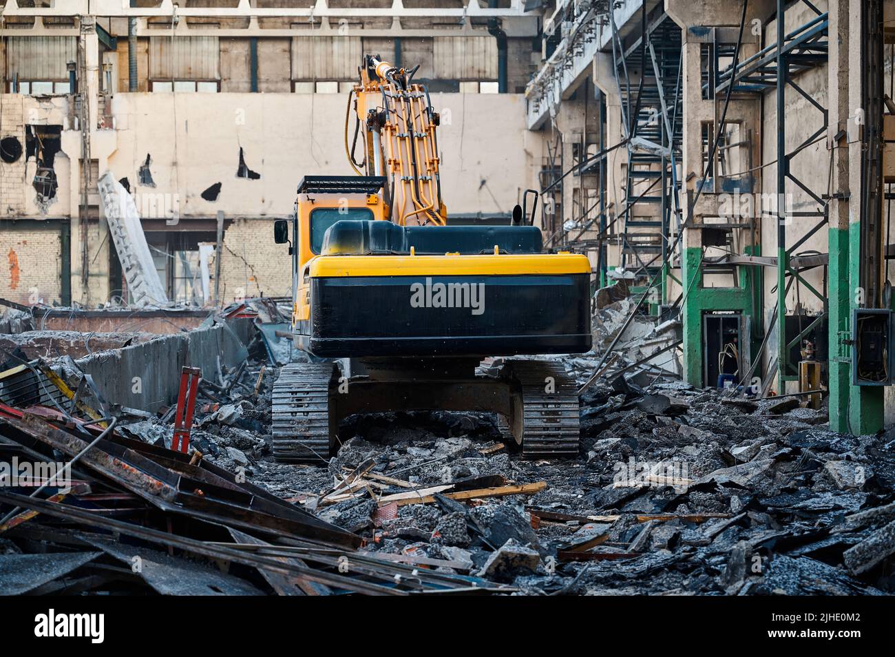 Hydraulic excavators at demolition site of industrial complex Stock ...