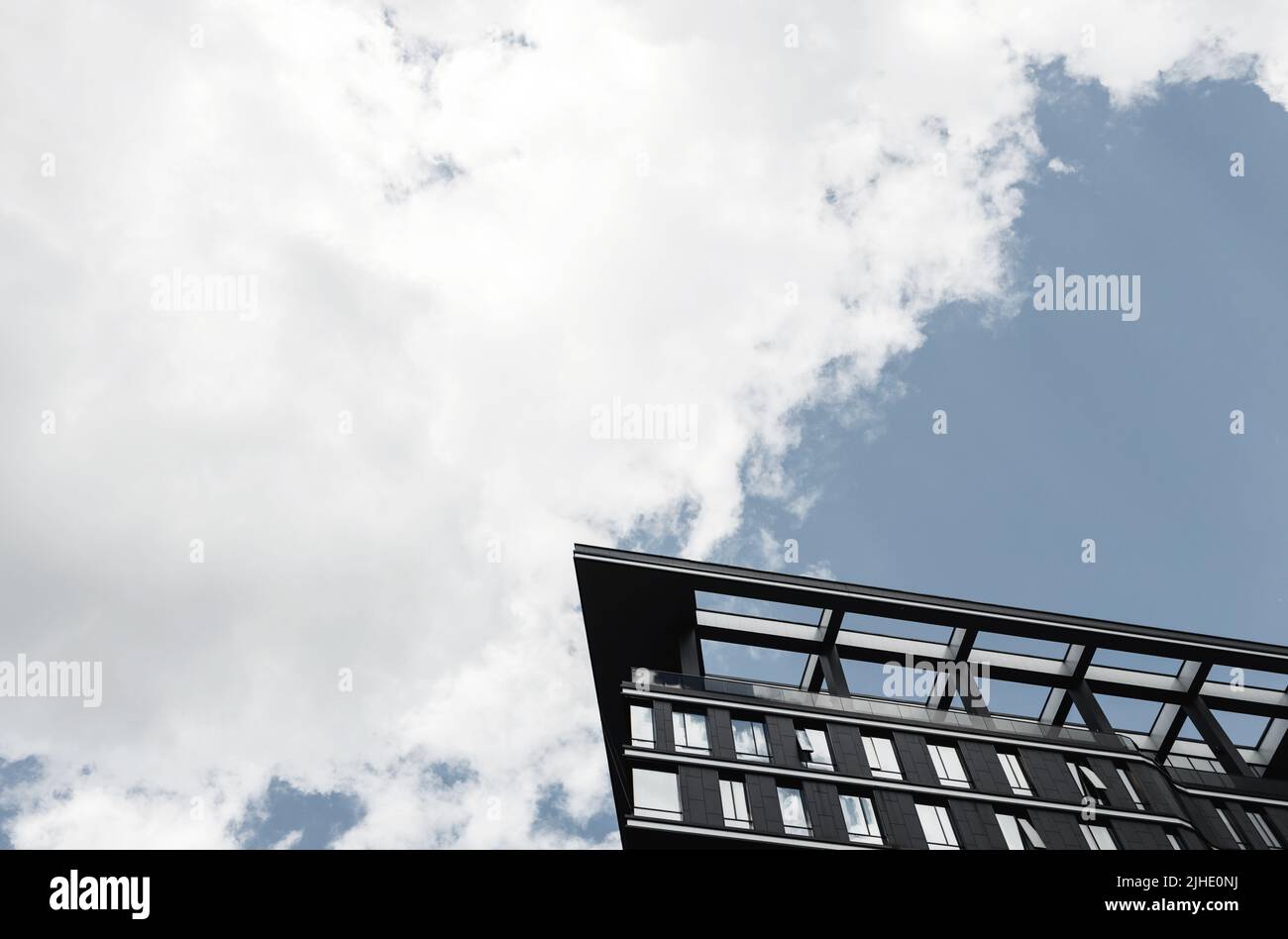 office buildings with modern corporate architecture over sky background ...