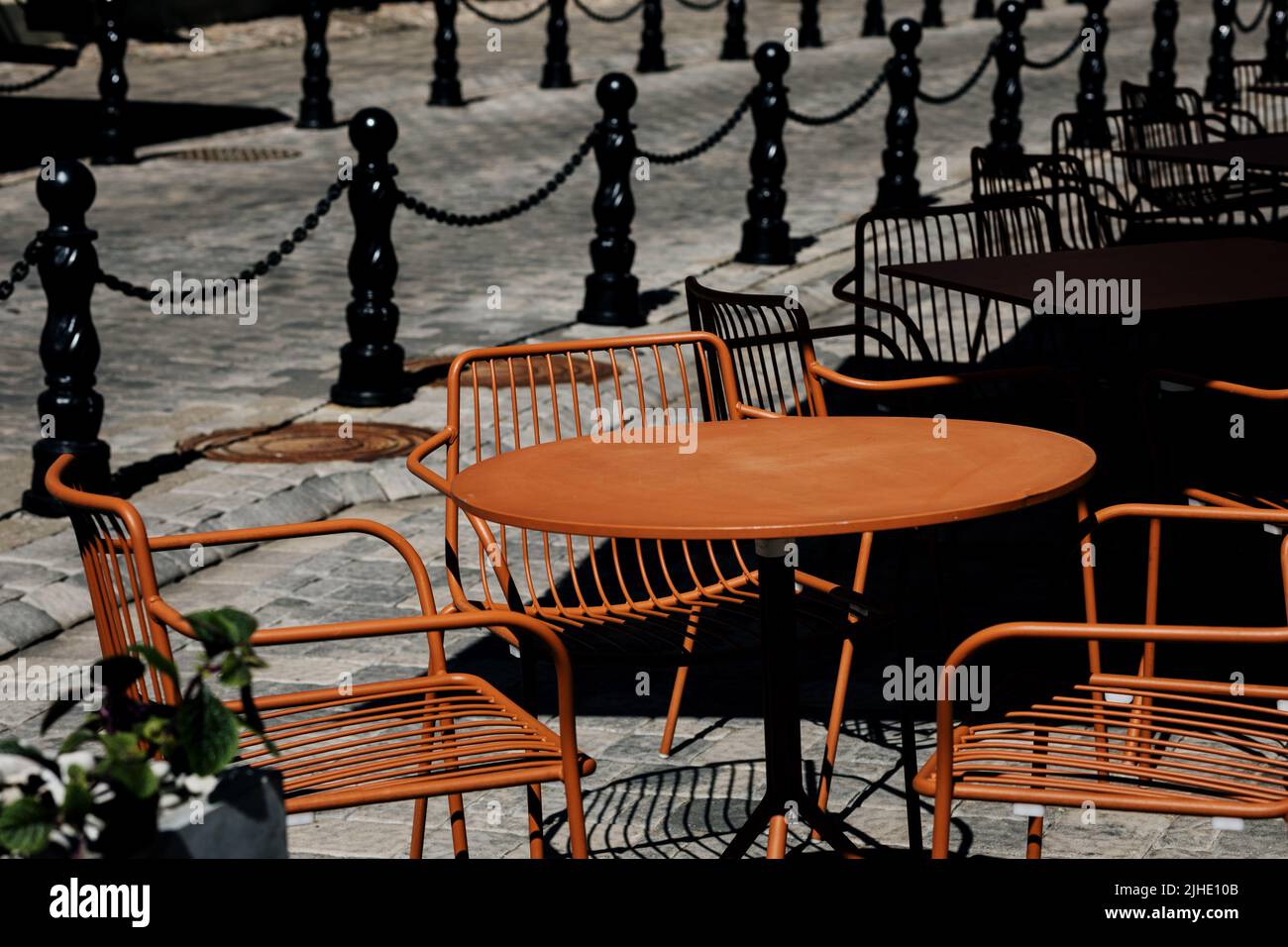 Chairs in the street hi-res stock photography and images - Alamy