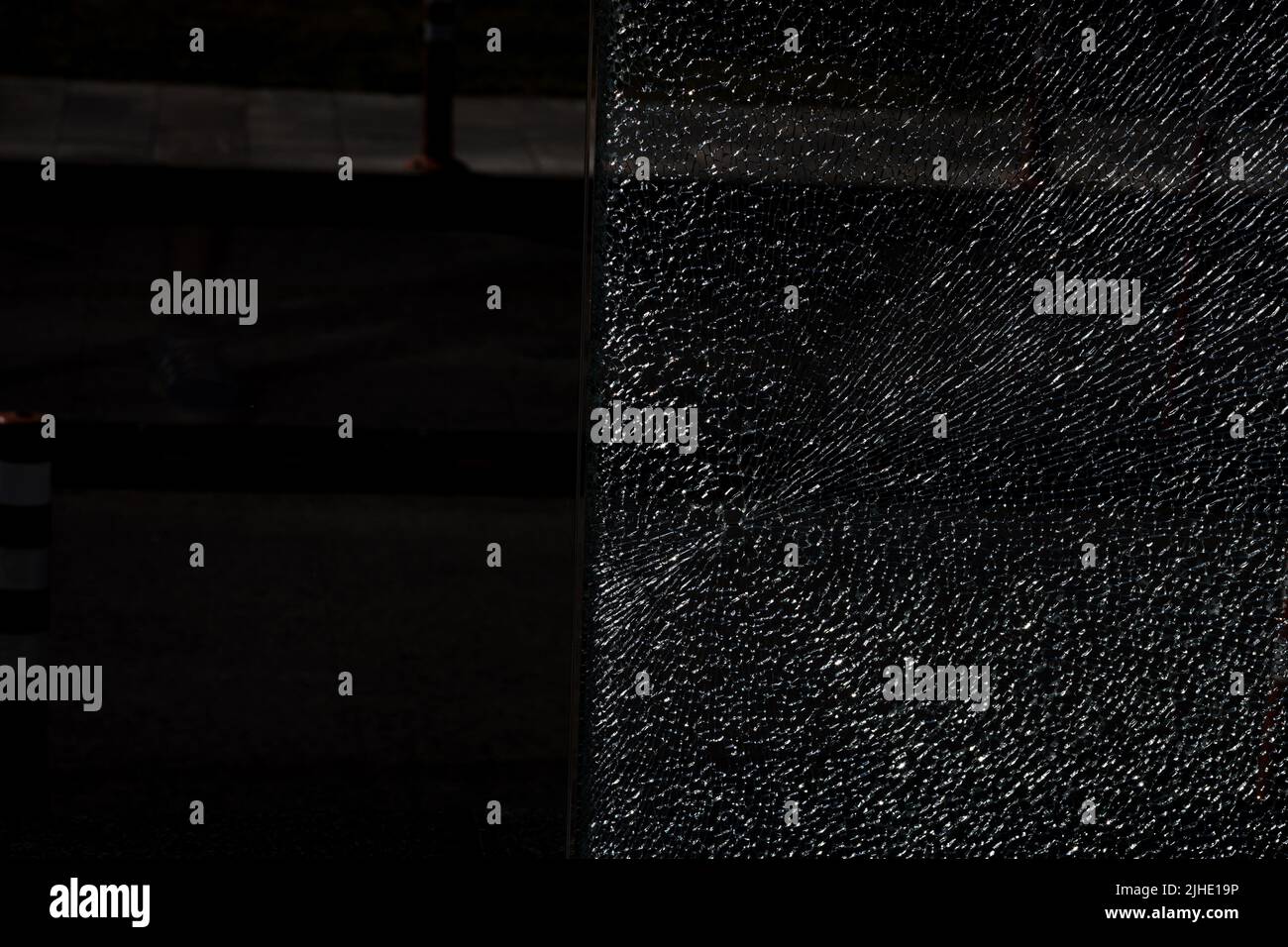 half of a whole and broken window. broken glass texture Stock Photo - Alamy