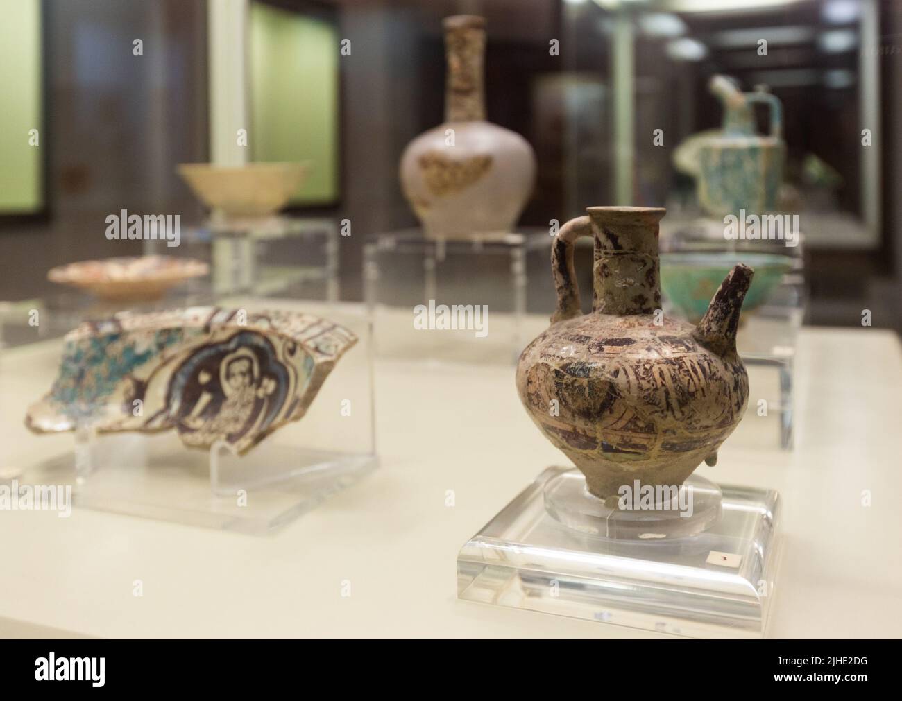 Ancient ceramic jugs in Museum of Islamic Art in Tiled pavilion ...