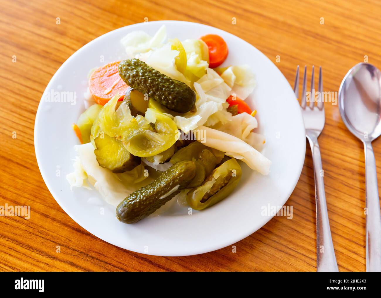Turkish pickles made with cucumber, cabbage and carrots closeup Stock ...
