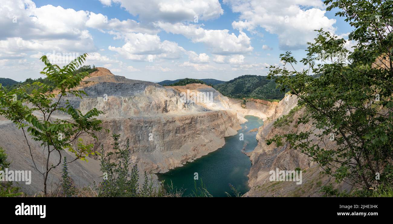 Panorama of high stone mountain quarries in the Rakovac in Serbia Stock ...